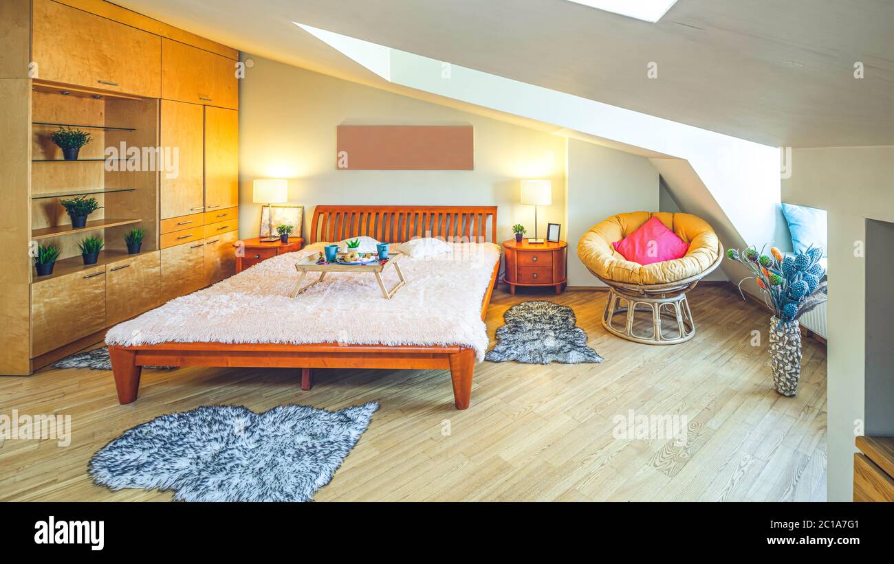 Modern interior of luxury bedroom with furniture. Front view of wooden ...