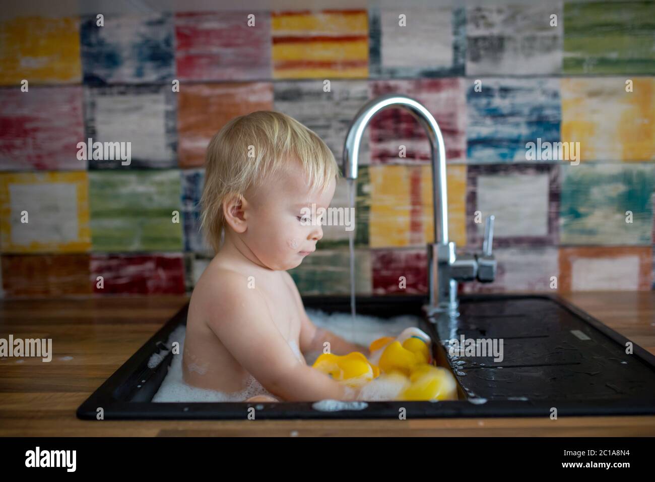 Infant toddler playing catch hi-res stock photography and images - Alamy