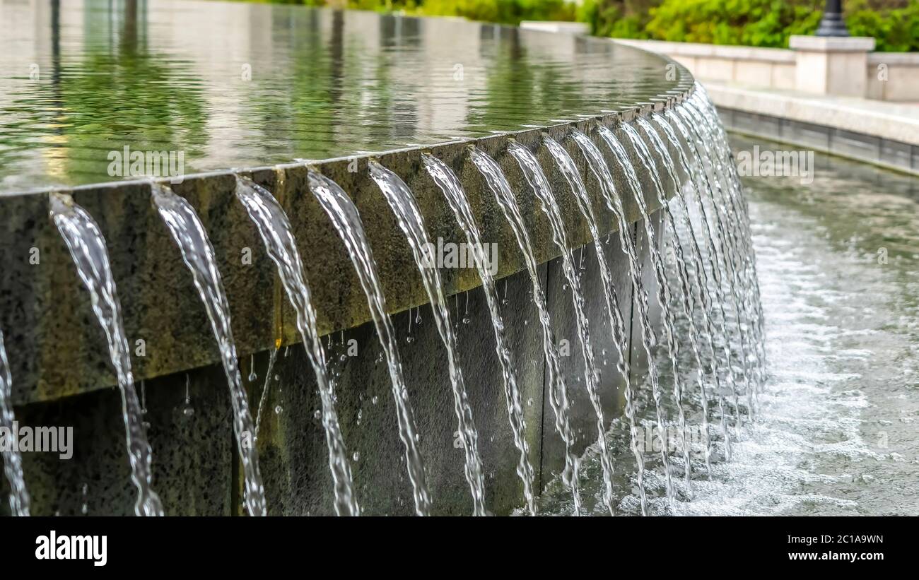 Panorama Stone fountain with trickling water and pool at the Utah State ...