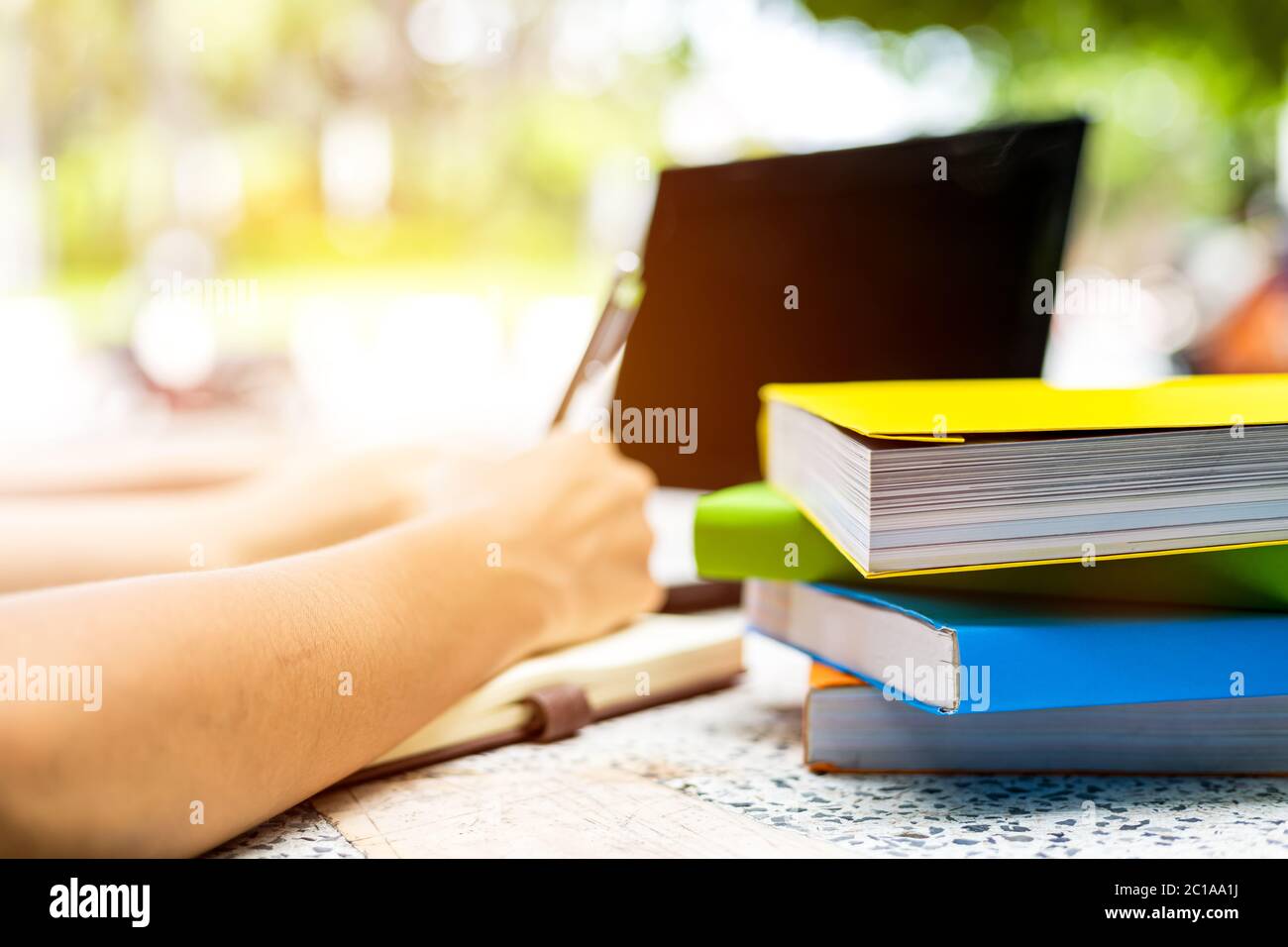 Books stack on the table at school Stock Photo - Alamy