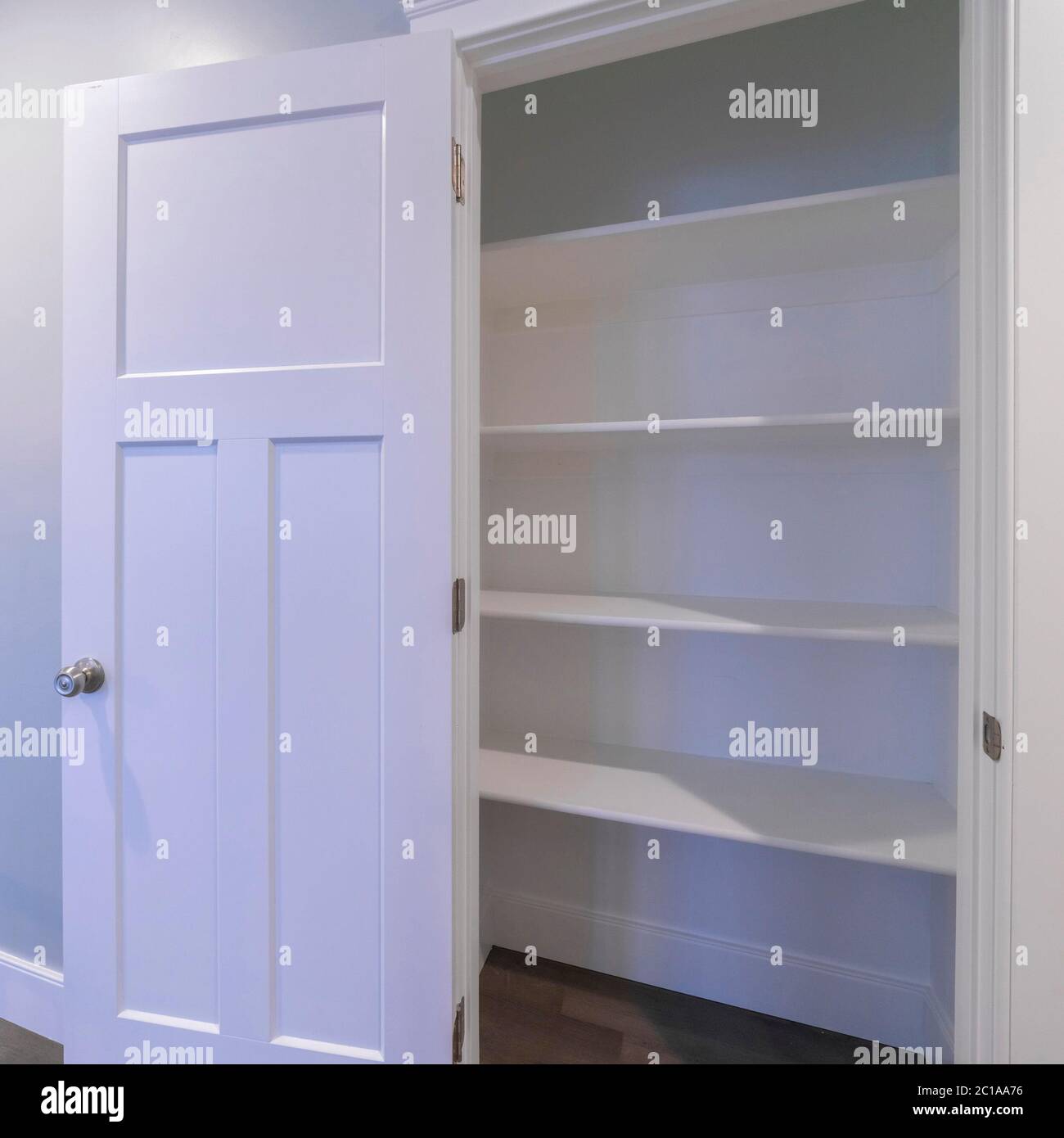 Square Open empty fitted cupboard or wardrobe interior Stock Photo - Alamy