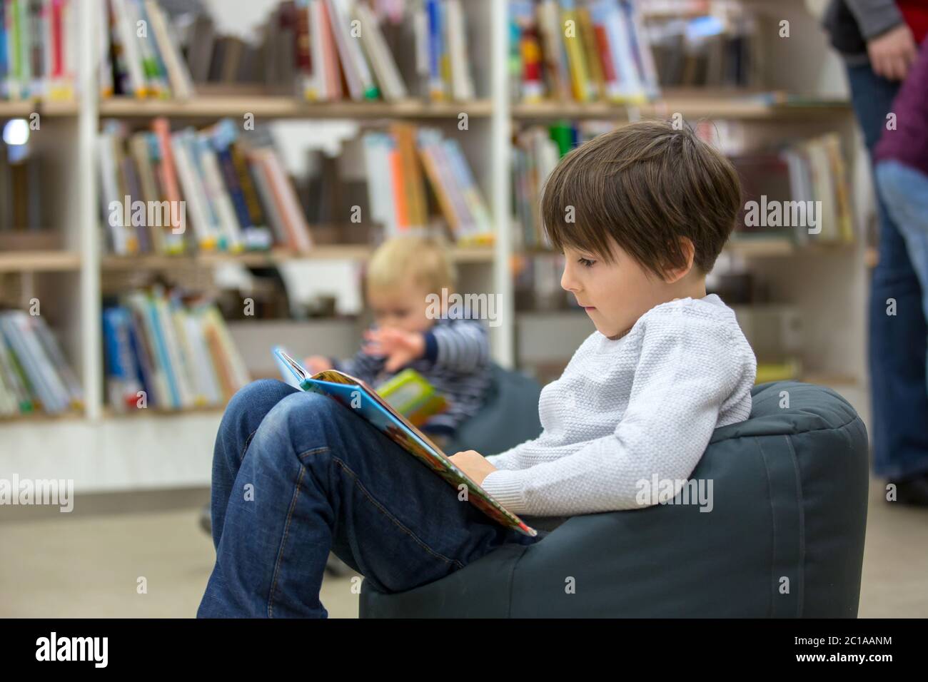 Smart children, boy brothers, toddler and school kid, educating ...