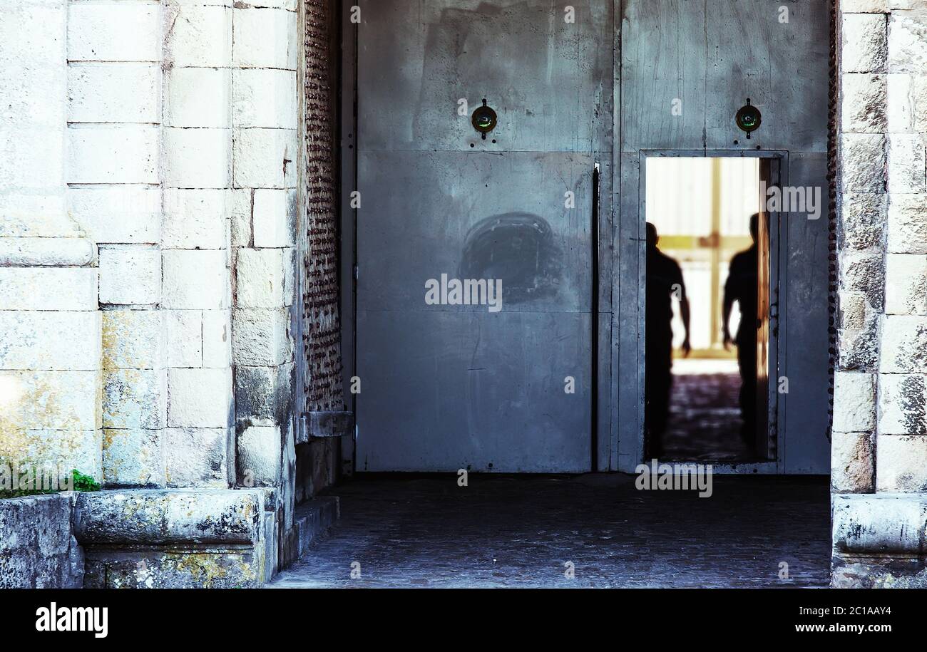 Entrance gate to prison with gaurds Stock Photo - Alamy
