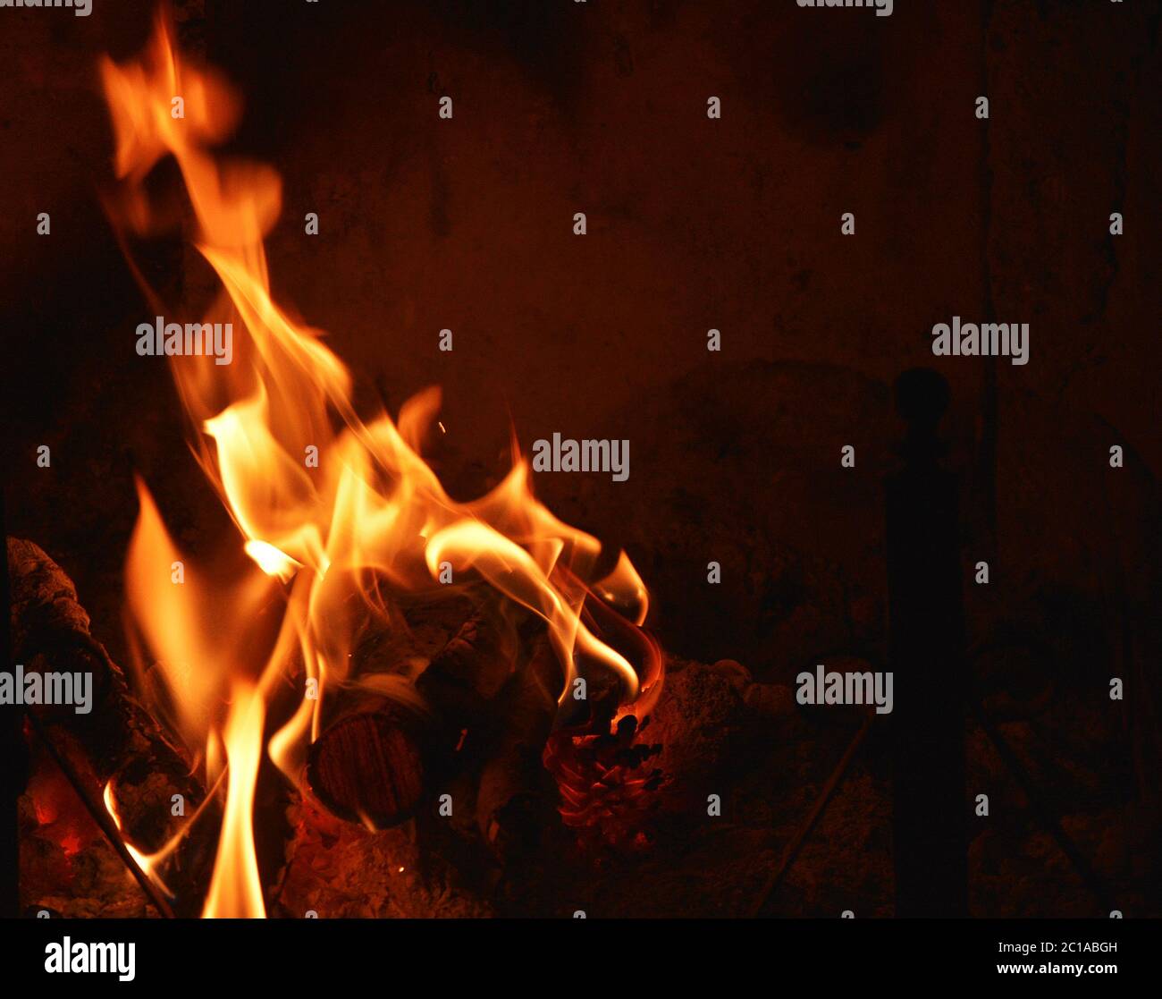 warm fire burning in a fireplace Stock Photo - Alamy