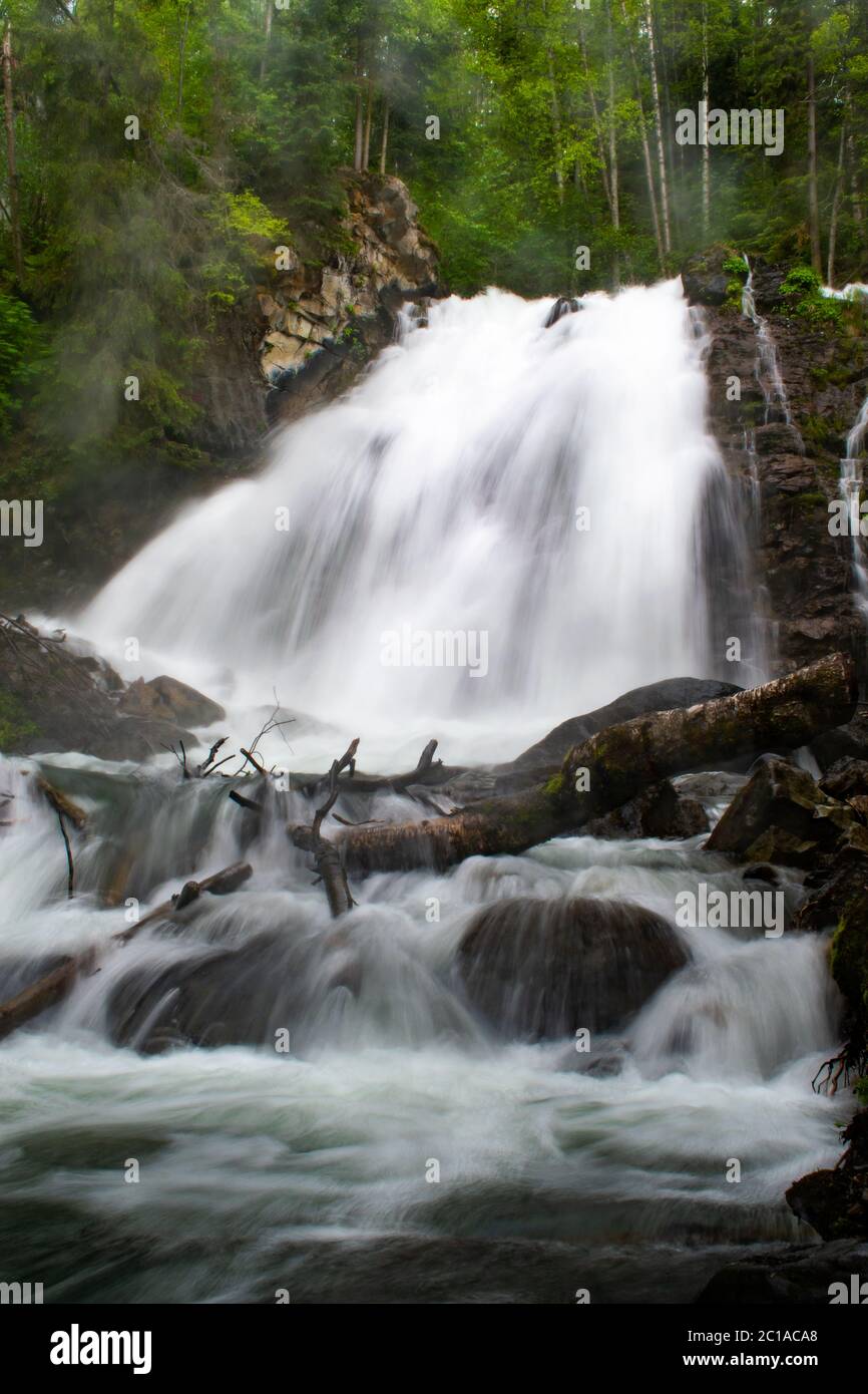 Cascading water continues beyond the falls Stock Photo - Alamy