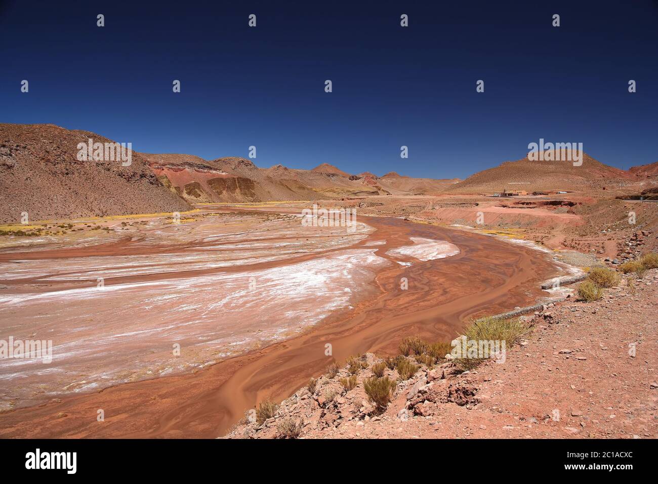 Riverbed of a red river in Argentina Stock Photo - Alamy