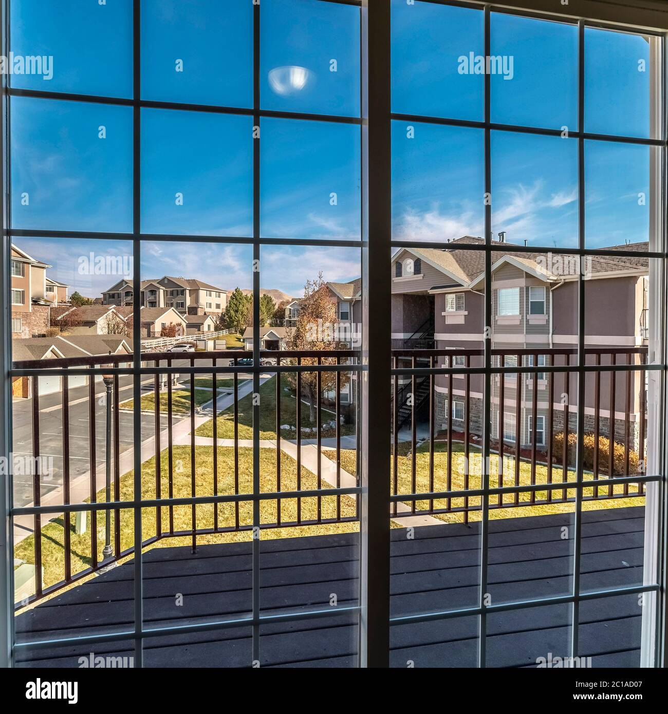 Square crop View through a window of an urban street Stock Photo - Alamy