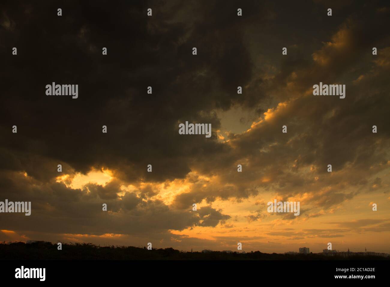 Evening sunset sky with rain dark clouds Stock Photo - Alamy