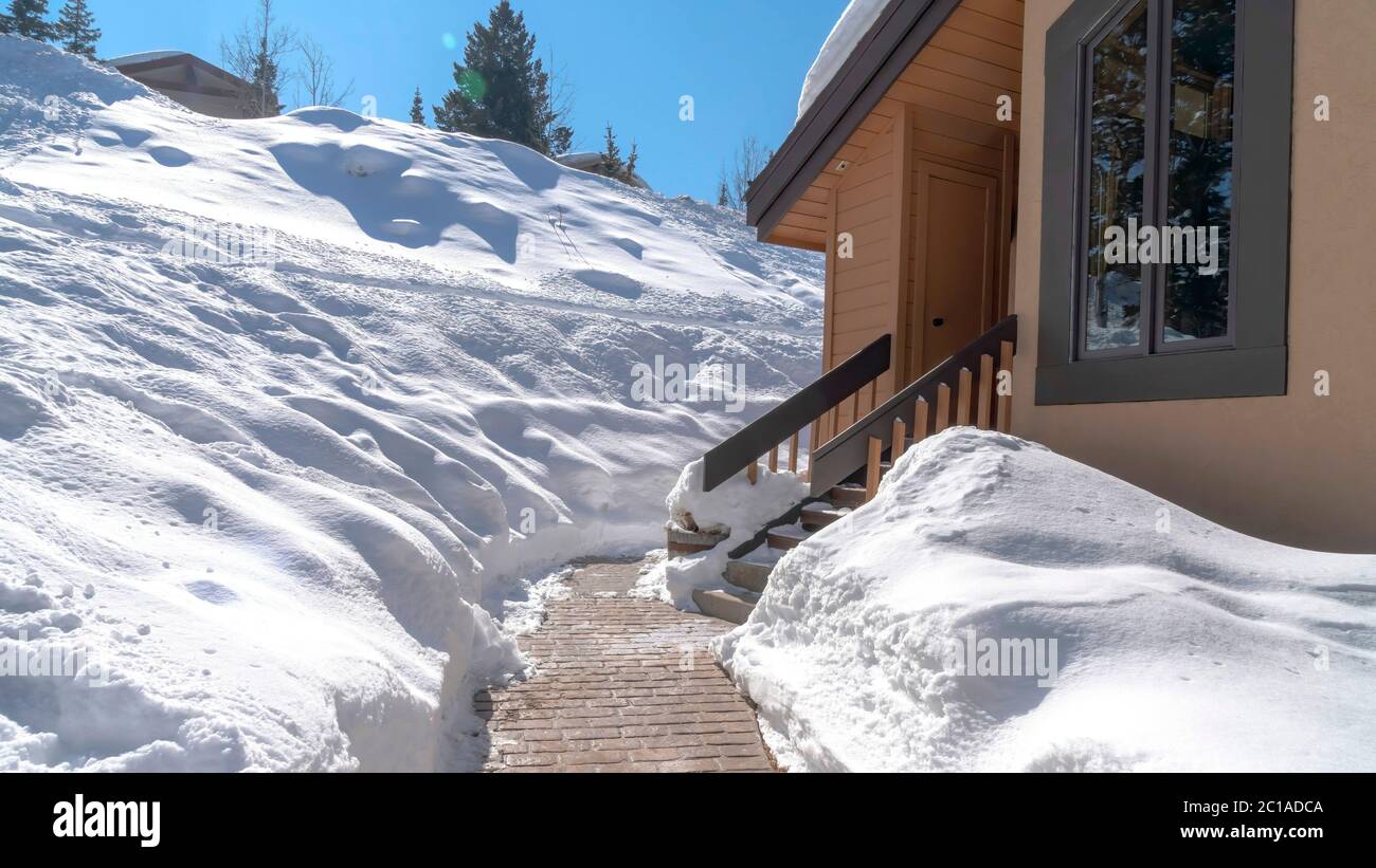 Panorama Stone brick pathway and stairs leading to home entrance amid ...