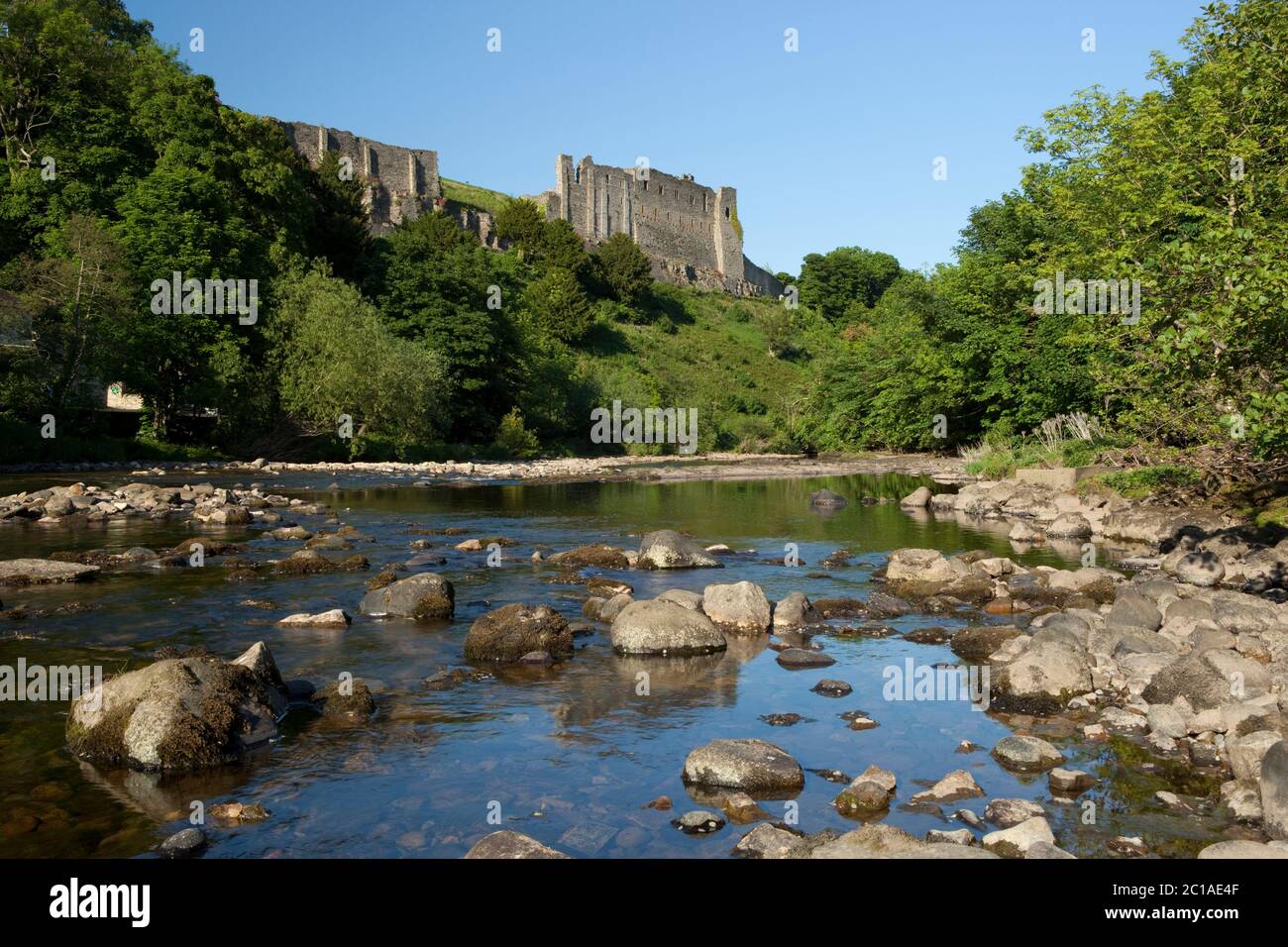 Ruined walls of 11th century Richmond Castle above the River Swale ...