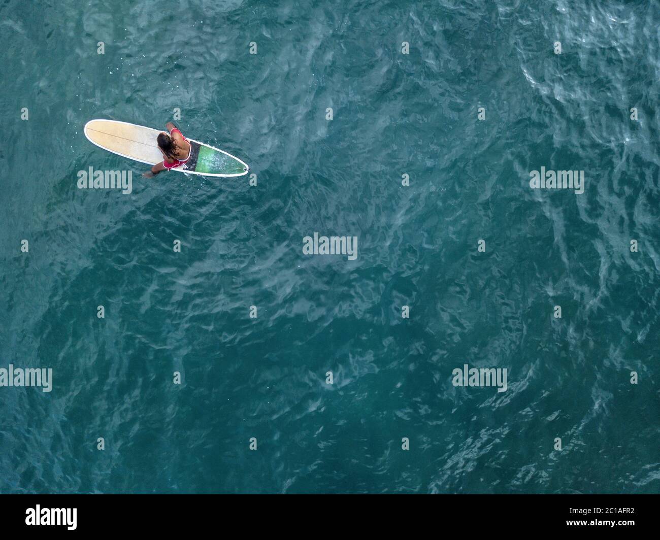 Aerial photo of surfer on board Stock Photo - Alamy