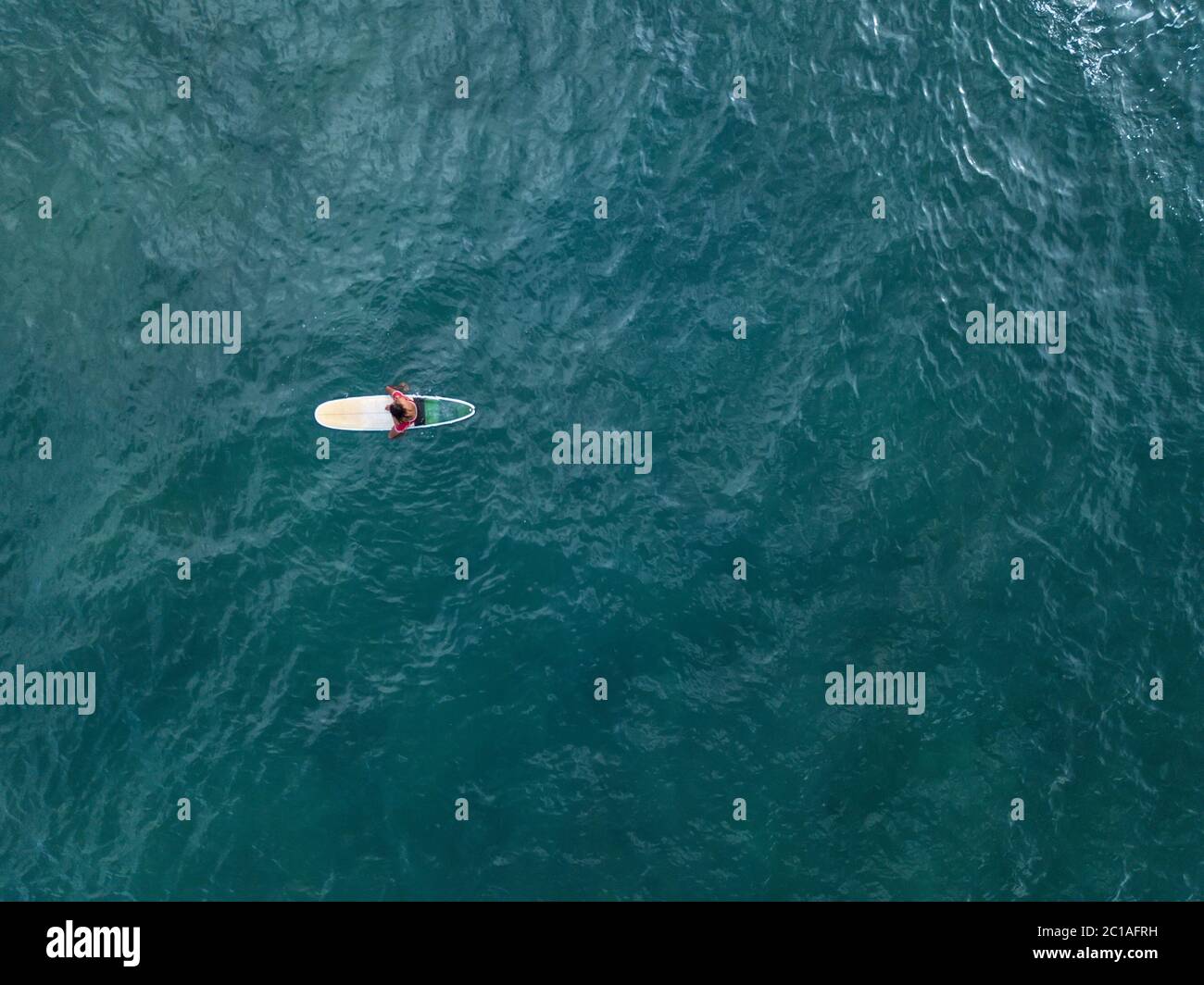 Aerial photo of surfer on board Stock Photo - Alamy