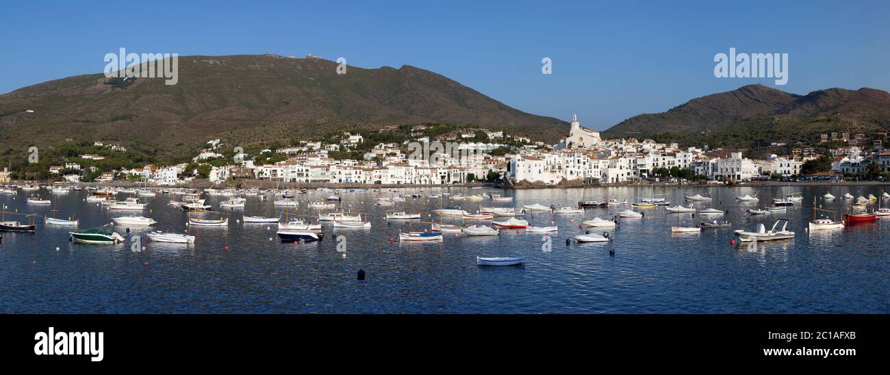 Panoramic of Cadaques with boats moored in bay Stock Photo - Alamy