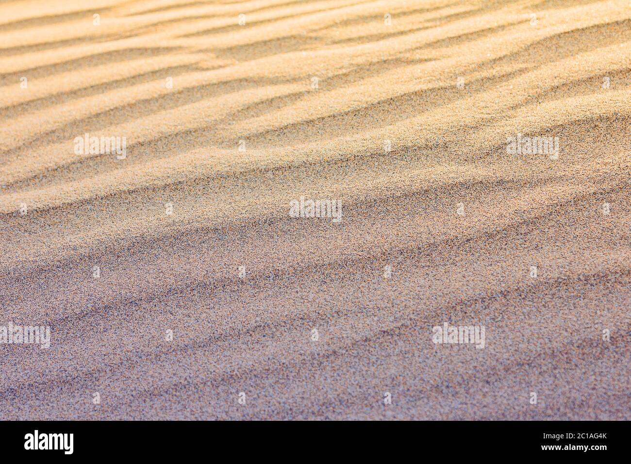 Desert sand dunes ripples. Background texture of sand Stock Photo - Alamy