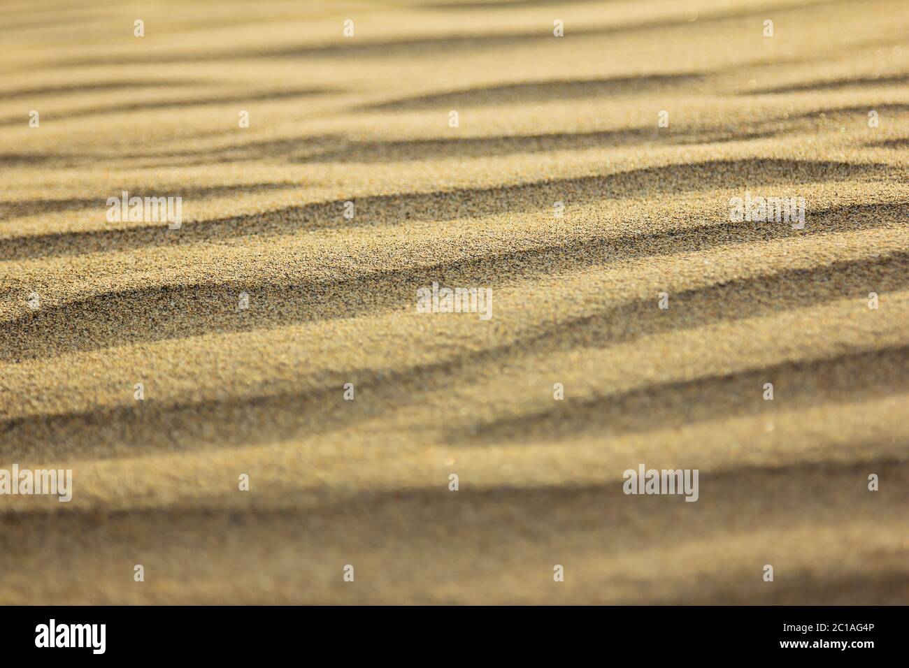 Desert sand dunes ripples. Background texture of sand Stock Photo - Alamy