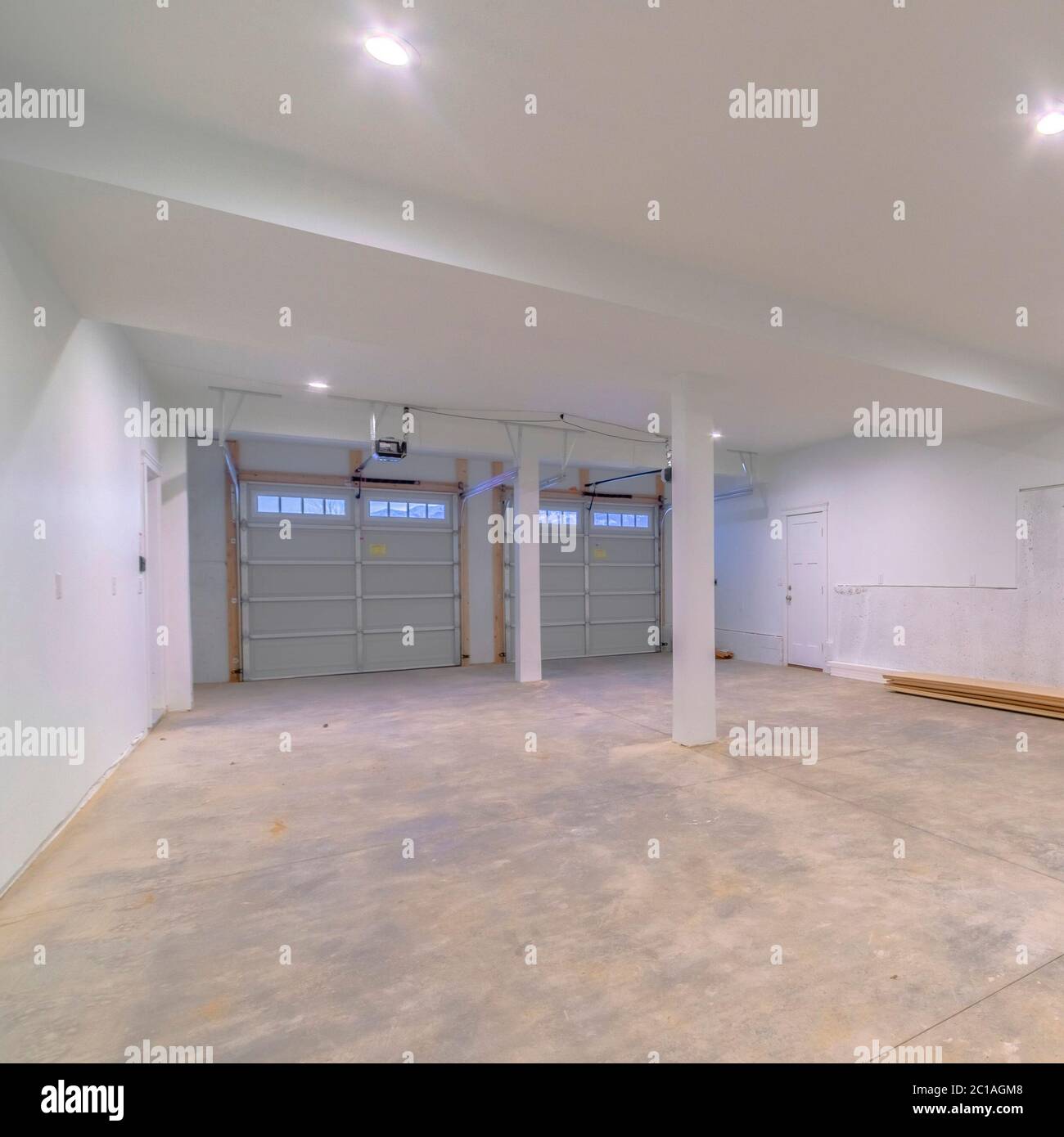 Square Large white clean empty garage for cars Stock Photo - Alamy