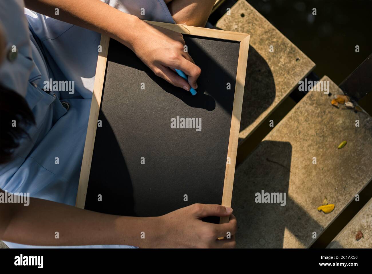 Hands use chalk for drawing, writing balckboard in the parks. Education ...