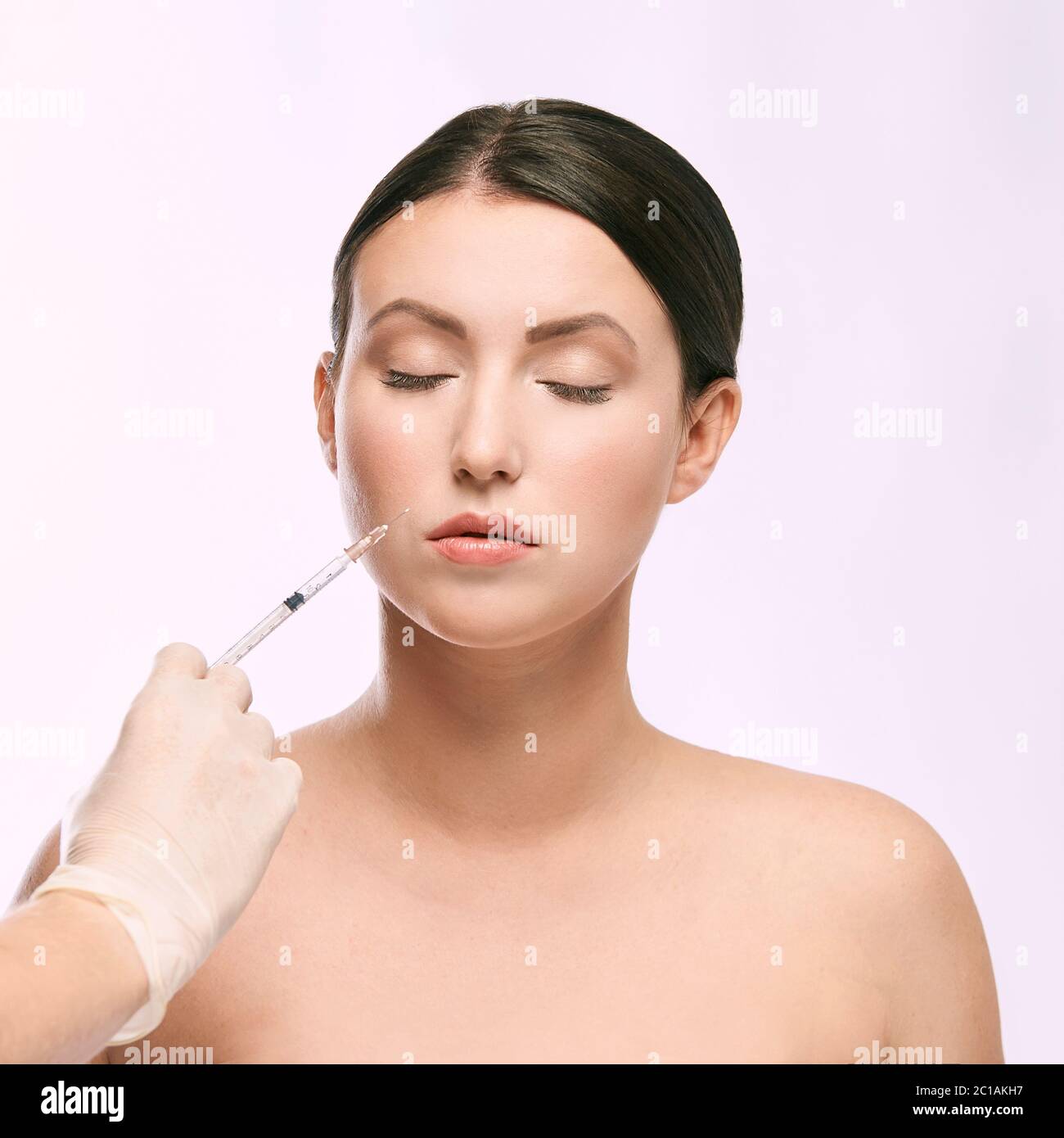 woman face injection. salon cosmetology procedure. skin medical care ...