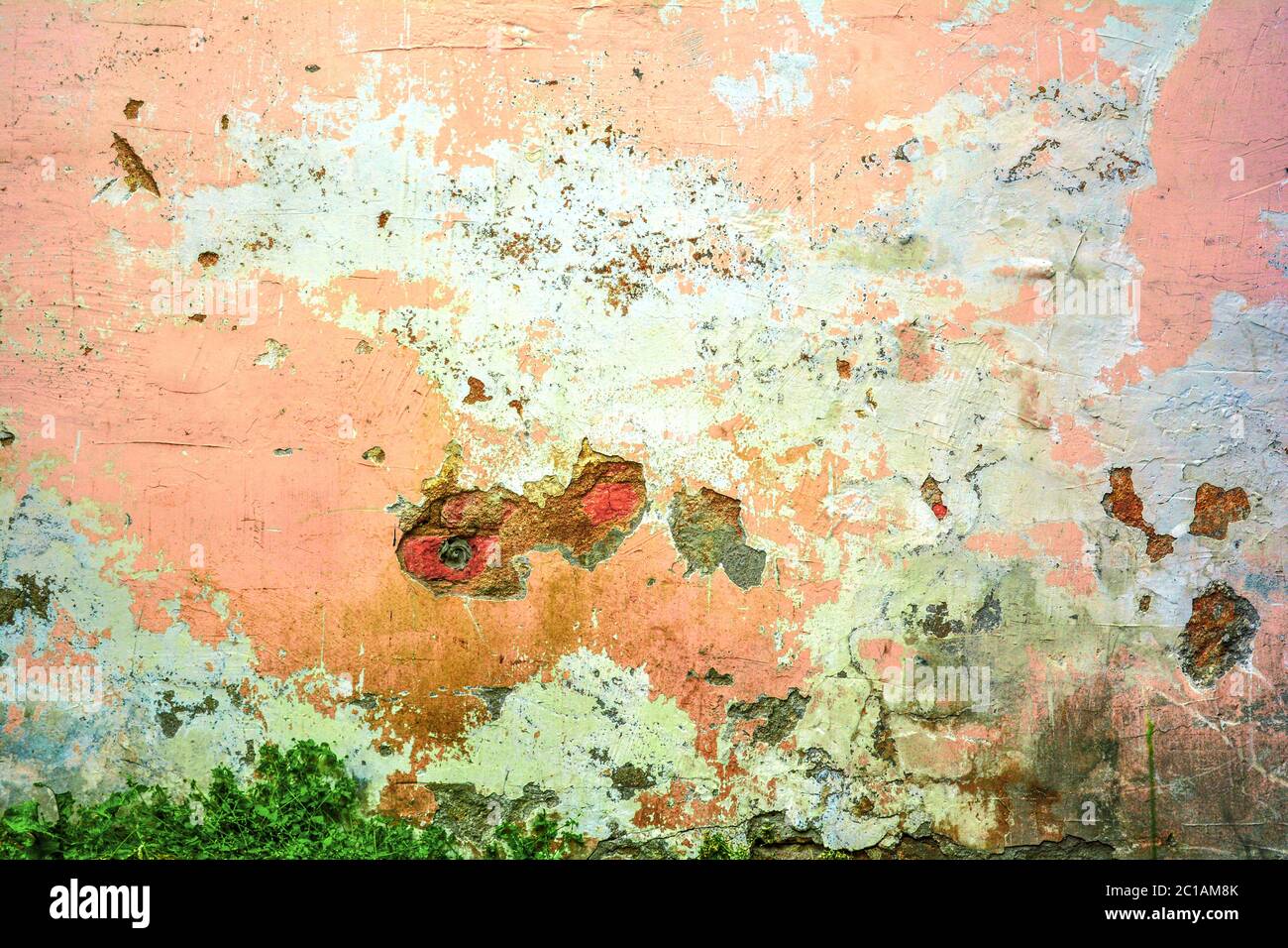 Old grunge messy plaster wall with peels of paint. Rough urban concrete ...