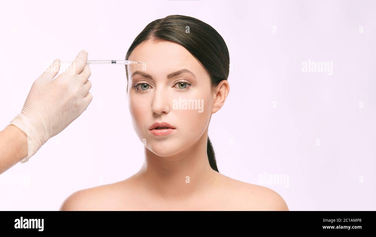 woman face injection. salon cosmetology procedure. skin medical care ...