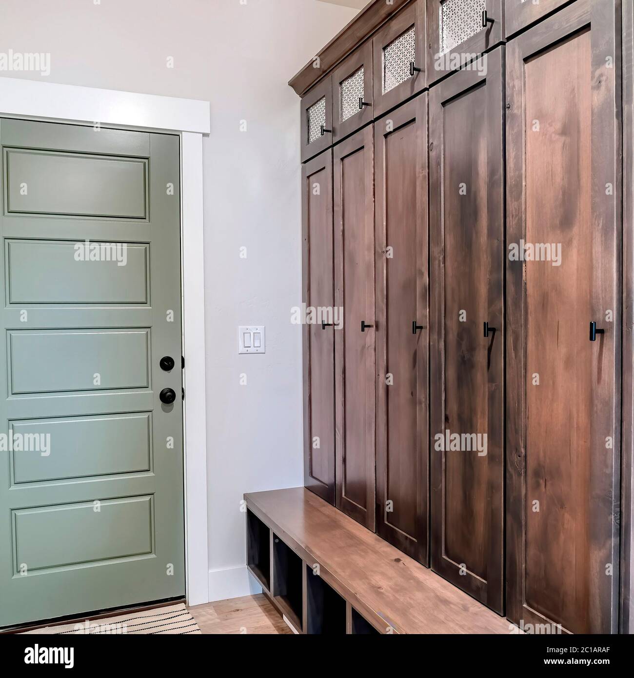 Square crop Home interior with fire door adjacent to the tall vintage ...