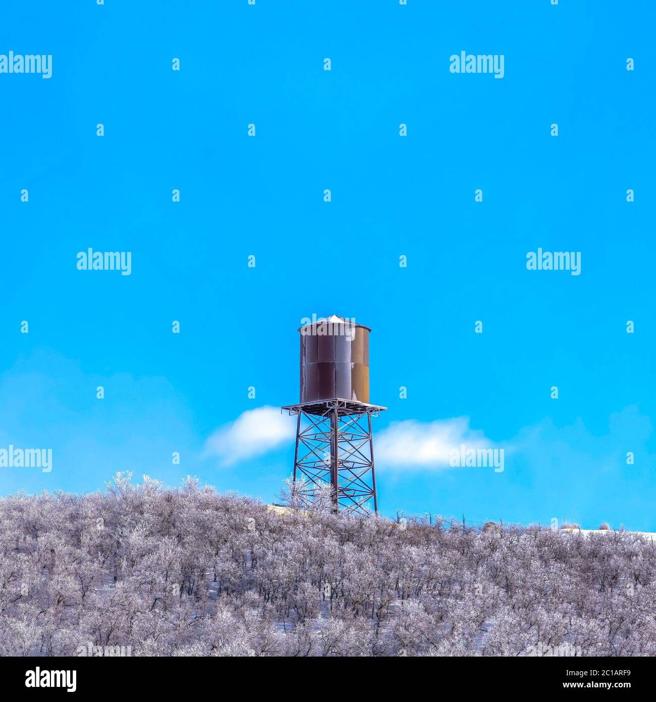 Square frame Cylindrical water storage tank container on a steel tower ...