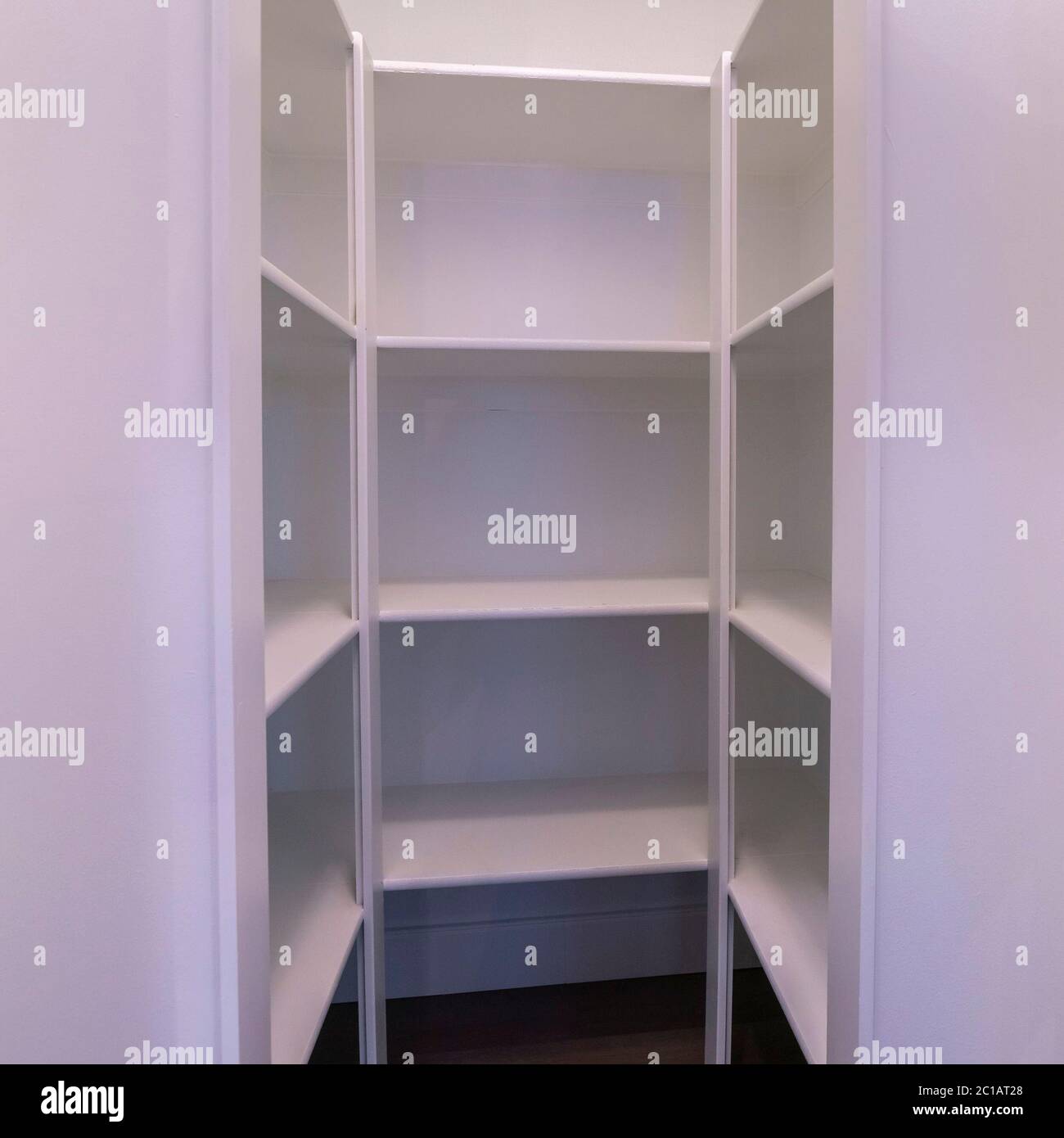 Square frame Empty interior of a walk-in wardrobe interior Stock Photo ...