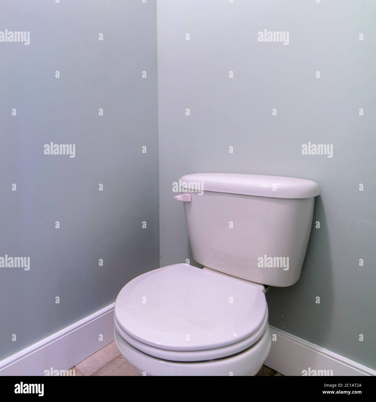 Square crop Closed toilet and cistern in a small lavatory Stock Photo ...