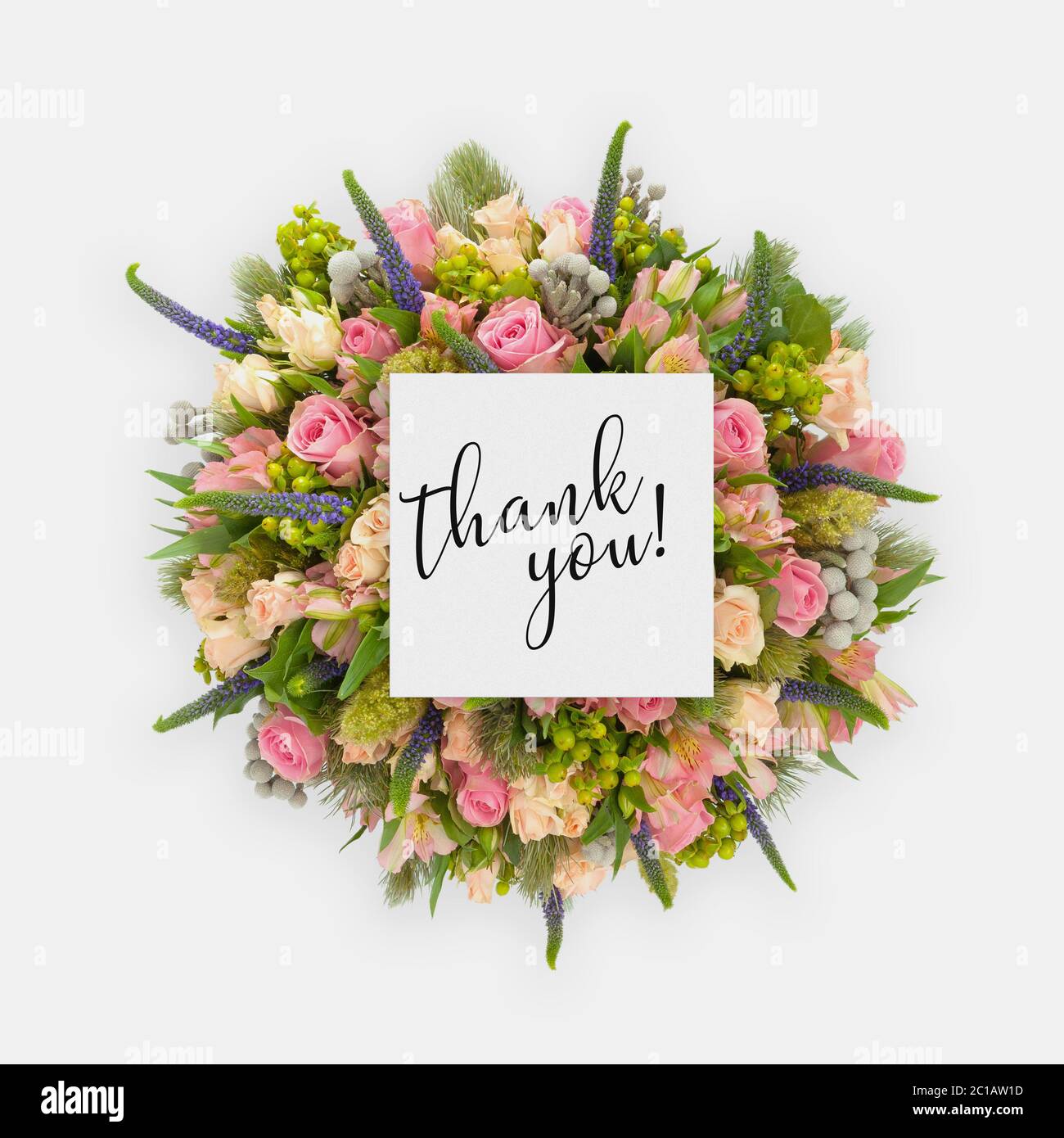 Fresh flowers bunch and card with words thank you written on it Stock ...