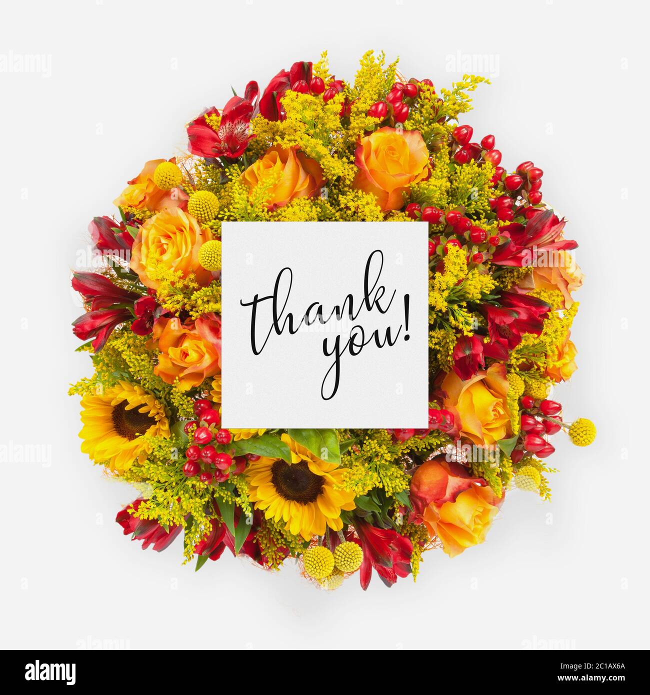 Fresh flowers bunch and card with words thank you written on it Stock ...
