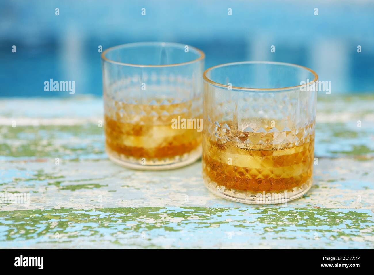 Whiskey by the pool Stock Photo - Alamy