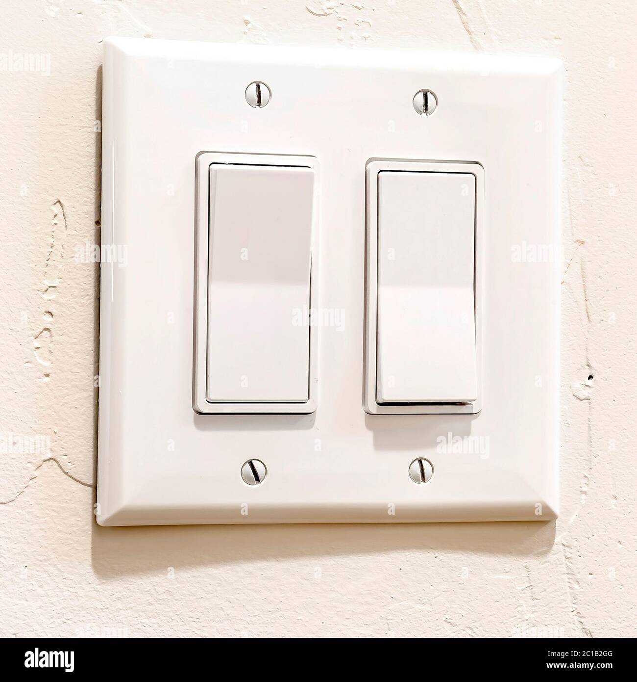Square crop Indoor multiple rocker light switch with broad flat levers ...