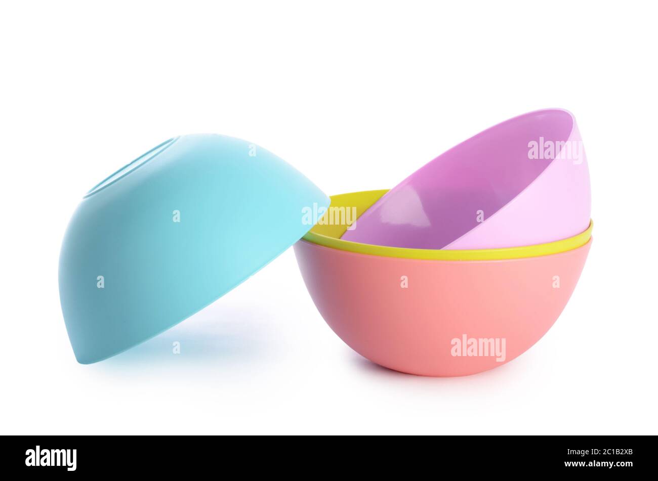 Plastic colorful plates isolated on white Stock Photo - Alamy