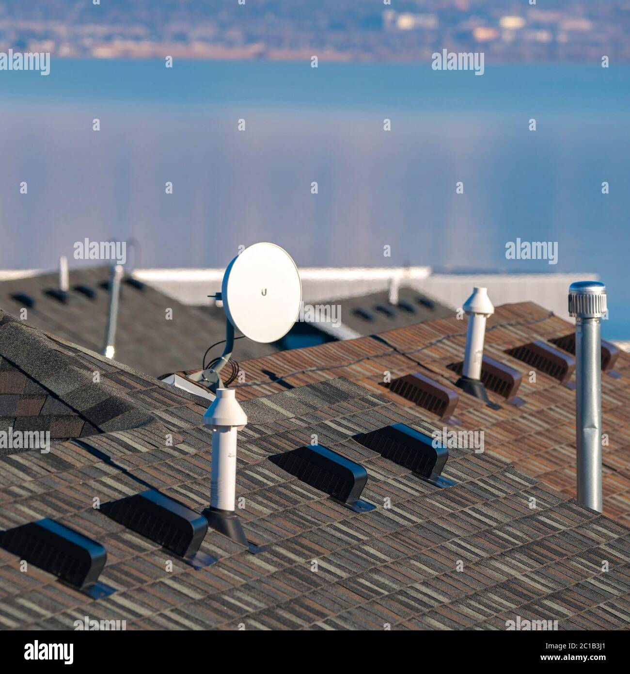 Square frame Television satellite dish mounted on a roof Stock Photo ...