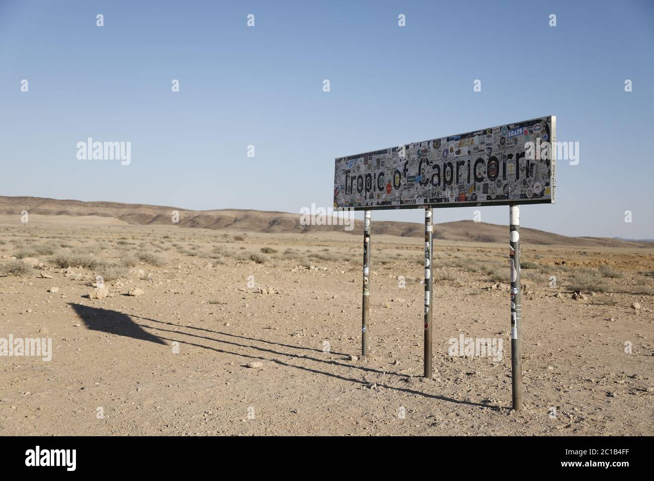 The Tropic of Capricorn sign in a desolated landscape in the middle of ...