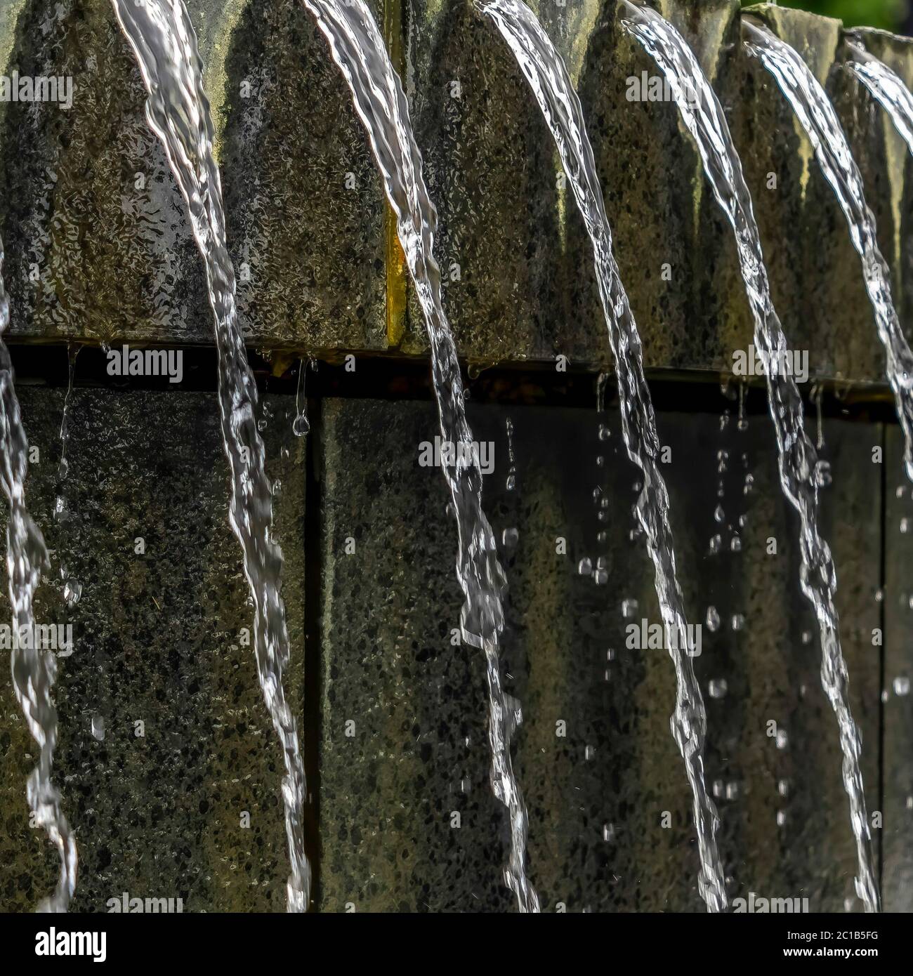Square Cicular stone fountain pool with trickling clear water in Salt ...
