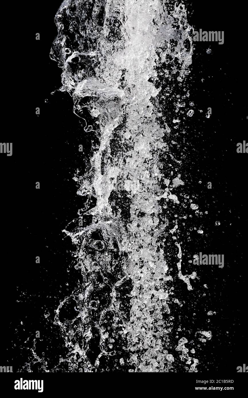Water splash over black background Stock Photo - Alamy