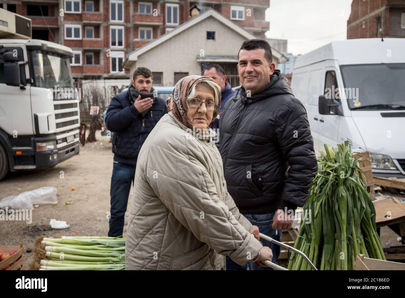 GNJILANE, GJILAN - KOSOVO - JANUARY 2, 2016: Old woman selling ...