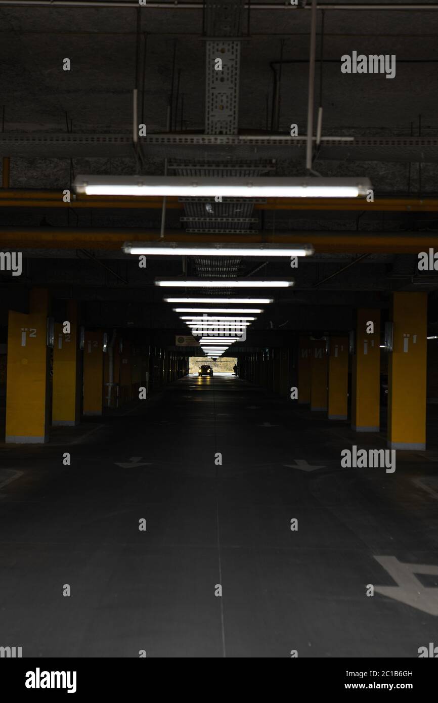 view of road in underground parking under mall Stock Photo - Alamy