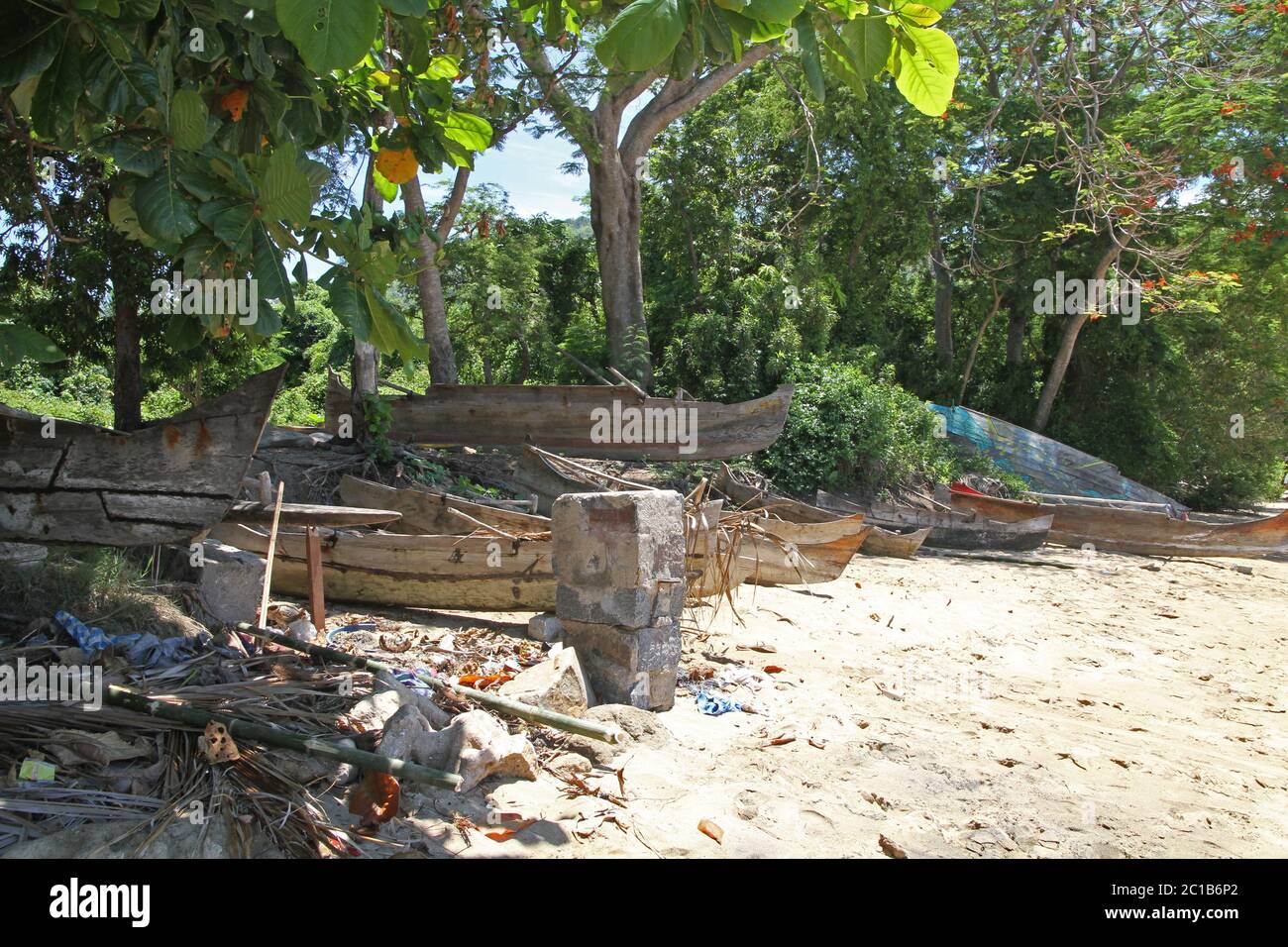 Wooden boats on beach, Ampangorinana Village, Nosy Komba Island ...
