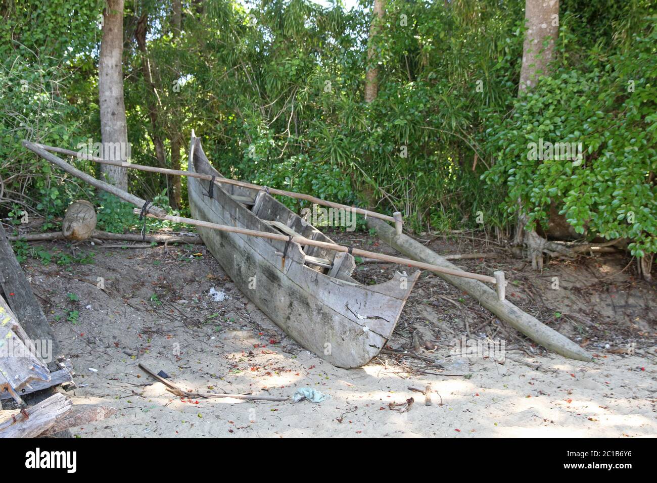 Wooden boat on beach, Ampangorinana Village, Nosy Komba Island ...