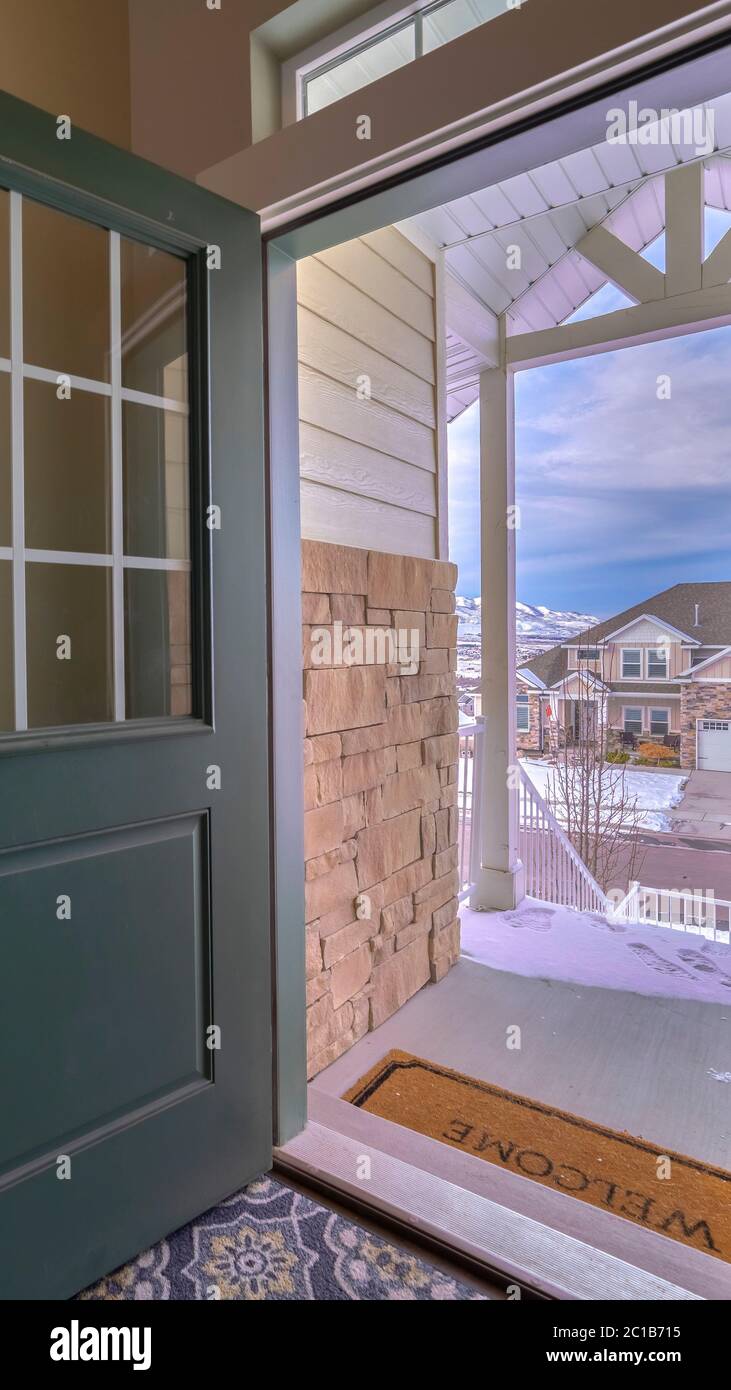 Vertical crop Looking out of an open front door of a house Stock Photo ...