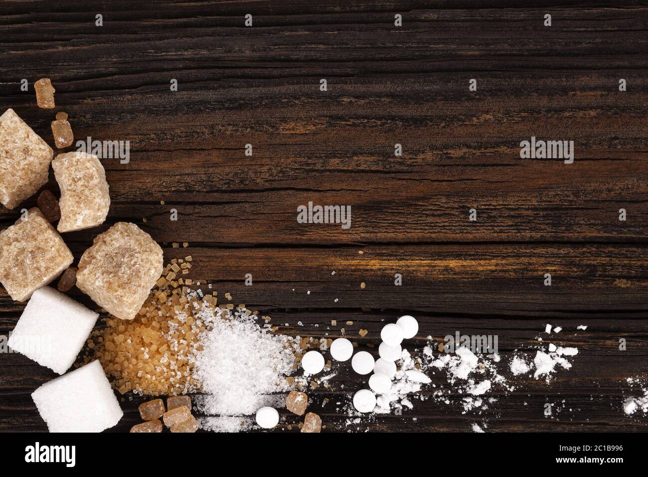 Various types of sugar from above on wooden table Stock Photo - Alamy