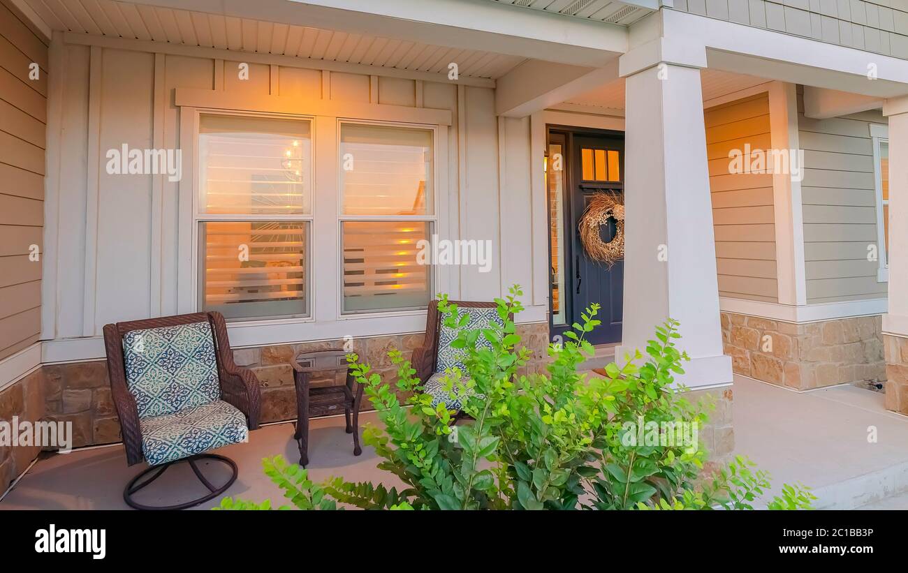 Panorama crop Home with outdoor steps that leads to the gabled entrance ...