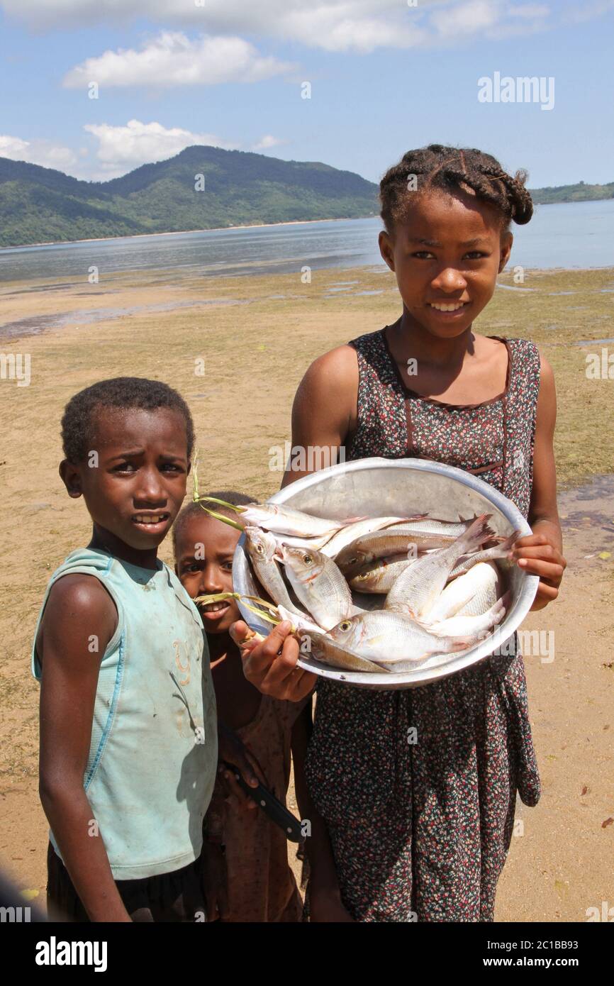 Children with fish hi-res stock photography and images - Alamy
