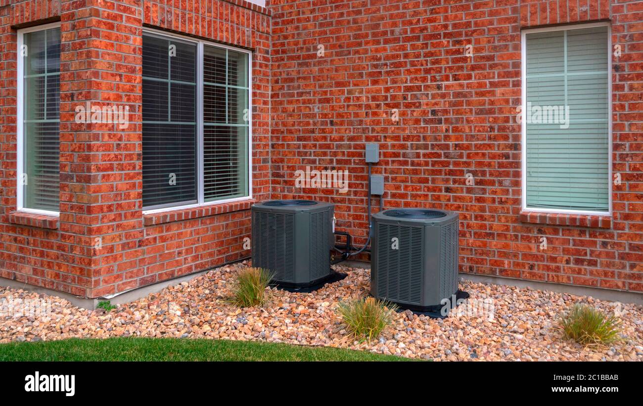 Panorama frame Corner brick wall to a building with two bins Stock ...