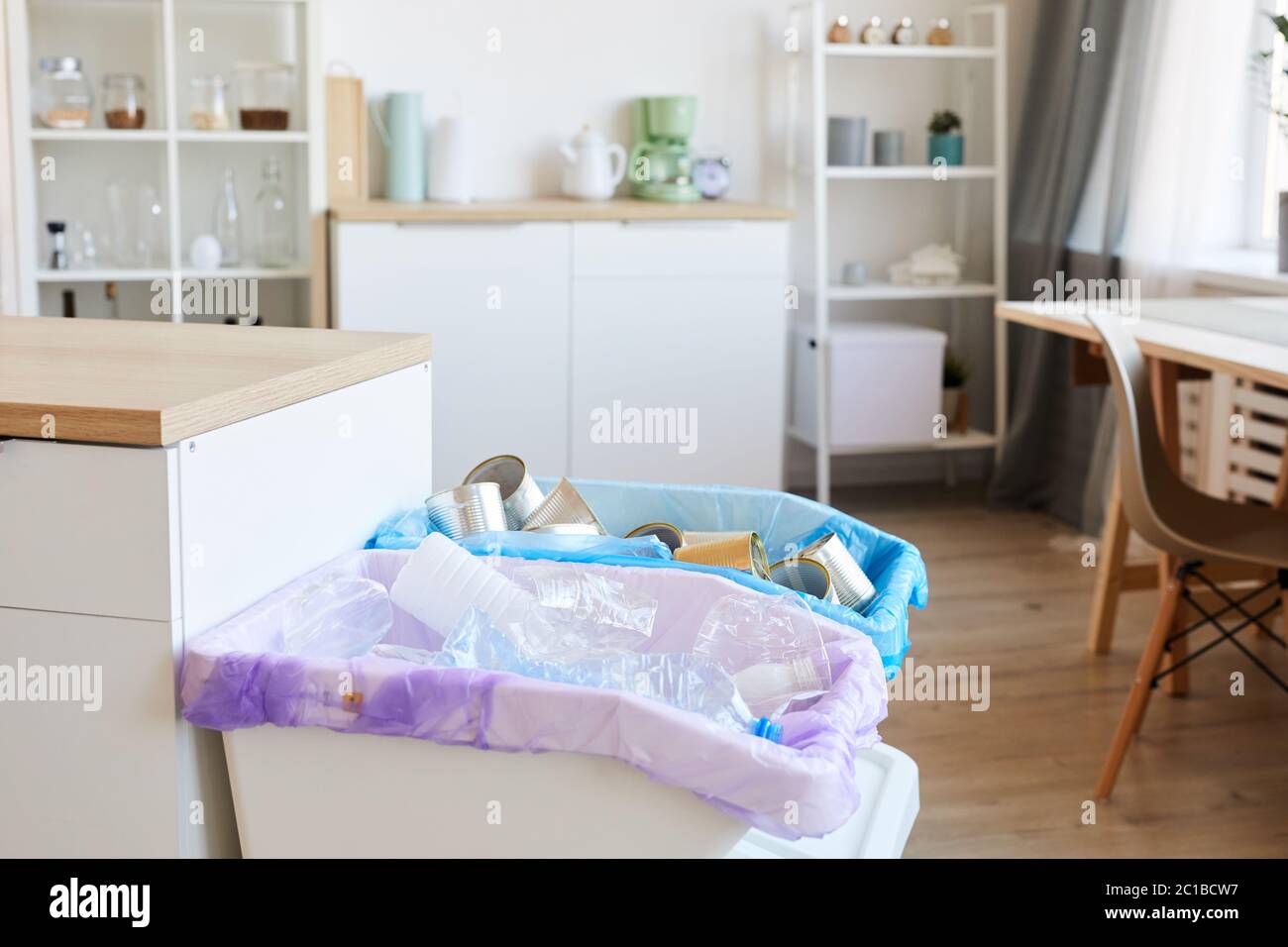 Close-up of trash bins for different sort of garbage one bin is for ...