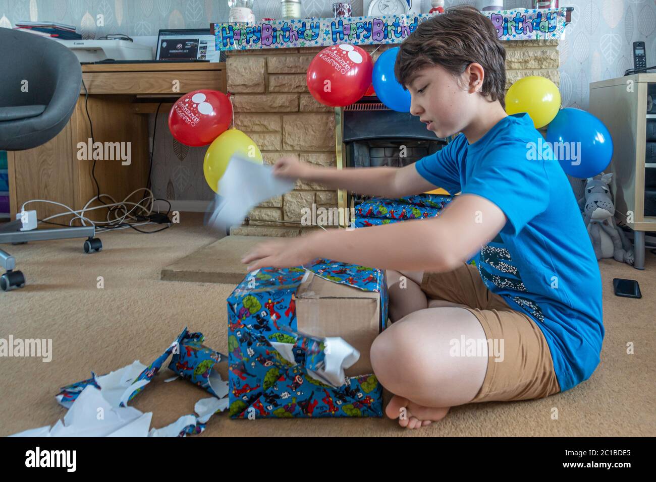 Boy presents hi-res stock photography and images - Alamy
