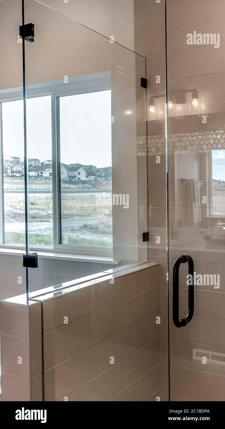 Vertical Frameless walk in shower stall and built in bathtub inside ...