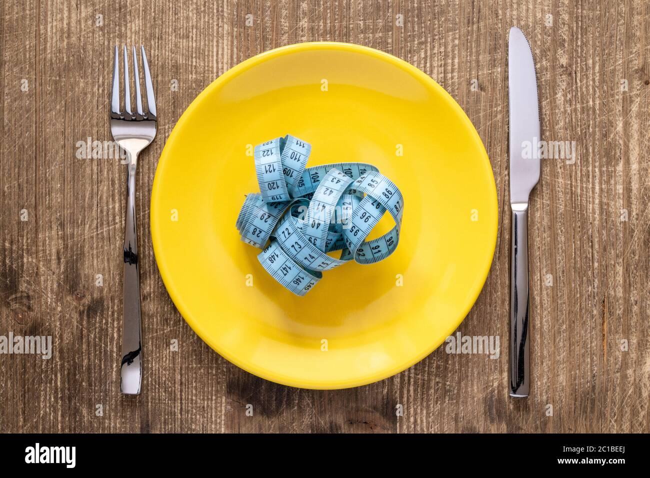 Plate with measure tape hi-res stock photography and images - Alamy